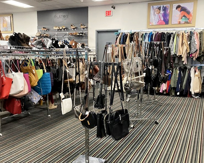 The accessories corner is where outfits become statements. Handbags hang like fashion fruit, ripe for the picking and priced for actual humans.