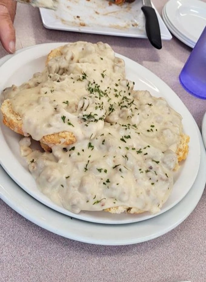 Behold the star attraction: biscuits smothered in creamy, peppery sausage gravy. This isn't just breakfast&mdash;it's an edible hug that locals line up for.