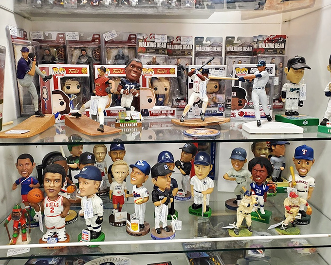 Baseball legends frozen in time as bobbleheads stand at attention, waiting for fans to recognize old friends from childhood afternoons spent listening to games on the radio.