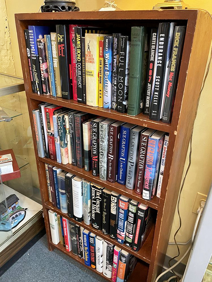 Books that have outlived their original readers stand ready for adoption. Each spine tells two stories&mdash;the one printed inside and its own journey through time.