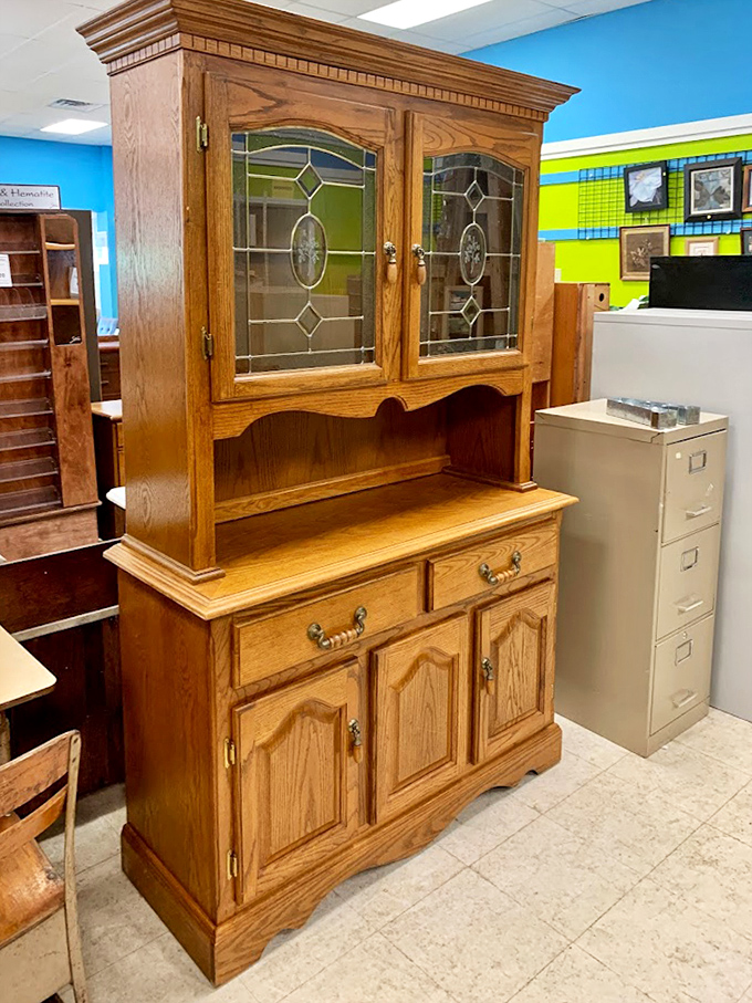 This oak beauty with stained glass survived decades of family dinners and is ready for yours too. 