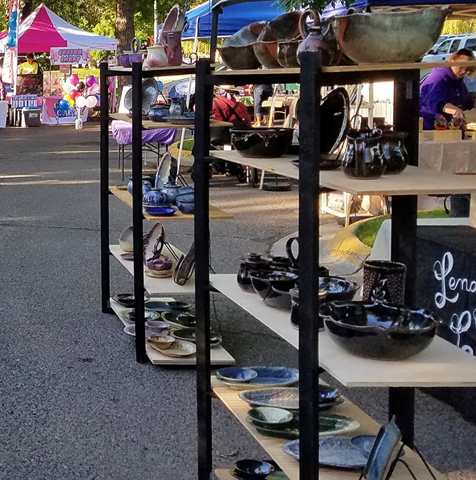 Handcrafted pottery gleams in the morning light, each piece silently promising to transform ordinary Tuesday dinners into something special.