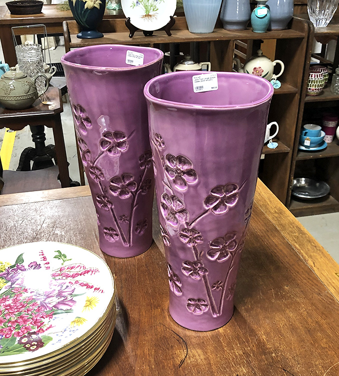 These purple ceramic vases aren't just containers; they're conversation pieces waiting to happen. Midcentury design that somehow feels both retro and completely current.