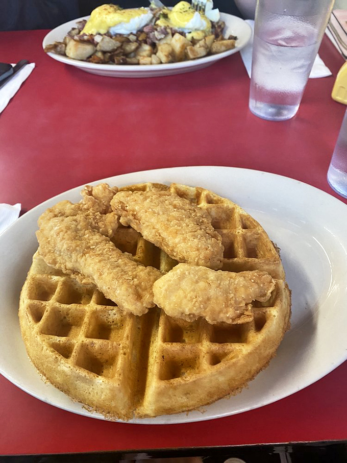 Oh, sweet and savory perfection! That crispy, golden fried chicken atop a fluffy waffle is the ultimate comfort food power move.