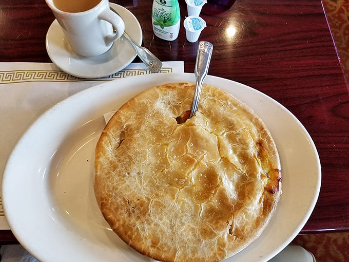 The star of the show: a chicken pot pie with a golden dome so perfect it deserves its own architectural award. Flaky, buttery crust hiding savory treasures beneath.