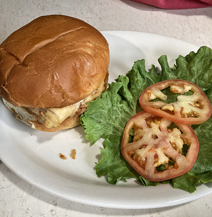 This chicken sandwich isn't trying to win any beauty contests, but one bite of that juicy perfection will have you planning your next visit.
