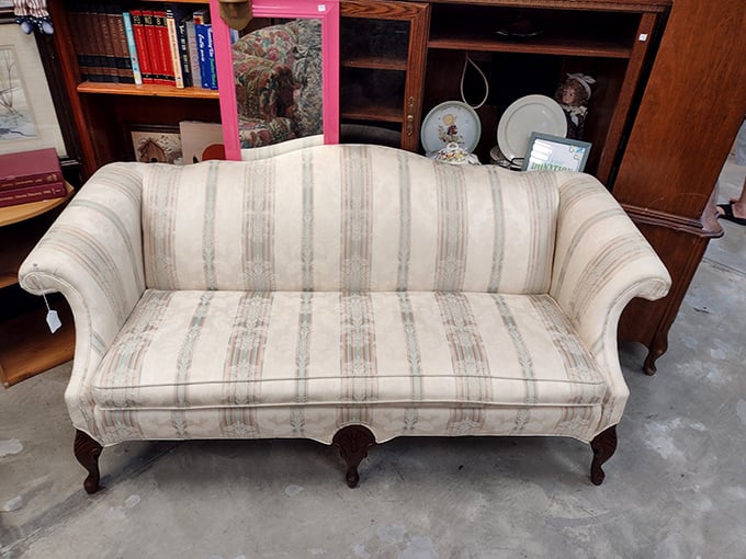 Elegance doesn't have to break the bank&mdash;this striped Chippendale-style camelback sofa brings a touch of "Downton Abbey" to your living room for thrift store prices.