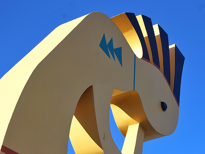 The intricate headdress details reveal surprising craftsmanship. Who knew roadside kitsch could be executed with such artistic flair?