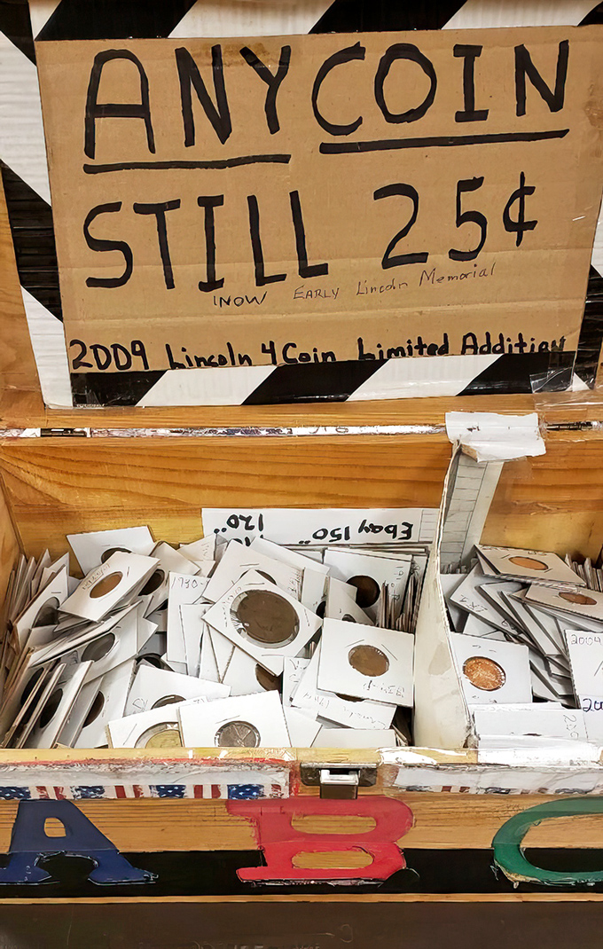 "Any coin still 25&cent;" proclaims the handwritten sign, proving that even in the coin-collecting world, bargains still exist.