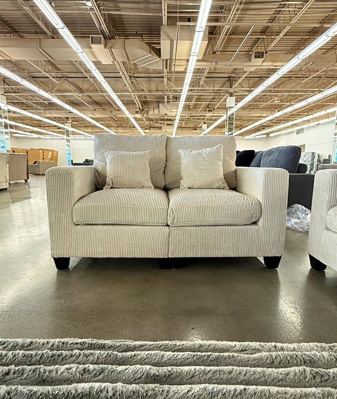 This corduroy loveseat isn't just furniture&mdash;it's the beginning of your "I can't believe I got this at an outlet" humble-brag story.
