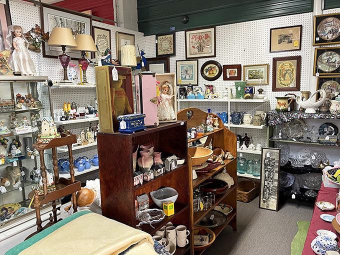 Porcelain dolls and collectibles stand at attention, silently judging your home decor choices while tempting your wallet. 
