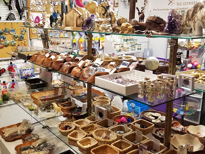 Handcrafted wooden bowls and natural decor items bring rustic charm to the industrial warehouse setting.