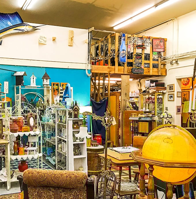 A vintage globe stands ready to show a world before GPS, while birdhouses and nautical treasures create a delightful jumble of possibilities.