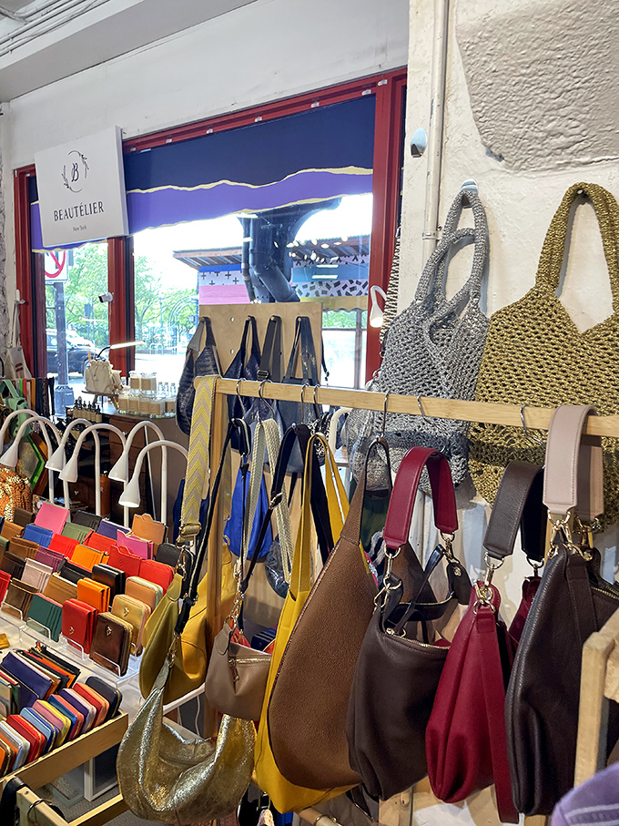 A rainbow of designer handbags dangles like fashionable fruit, ready to be plucked by savvy shoppers with an eye for quality and color.