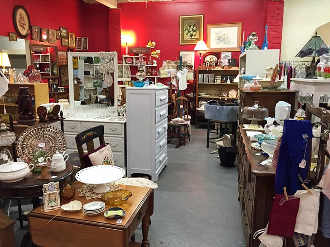 Red walls create the perfect backdrop for this carefully curated chaos of vintage furniture and collectibles&mdash;like your eccentric aunt's house, but everything's for sale.