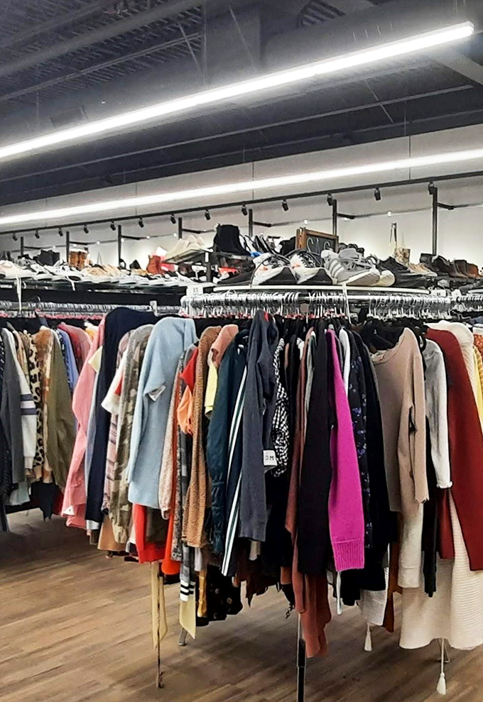 Rows of possibilities stretch before you like a rainbow of second chances, each hanger holding someone's former favorite waiting to become yours.