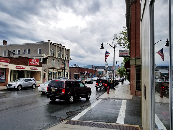Even on rainy days, downtown Littleton maintains its charm, with storefronts glowing like beacons against dramatic mountain-town skies.