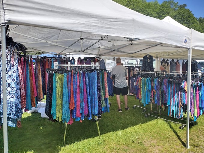 A rainbow of possibilities! Vibrant dresses and garments sway gently in the Vermont breeze, promising second chances and fresh style statements.