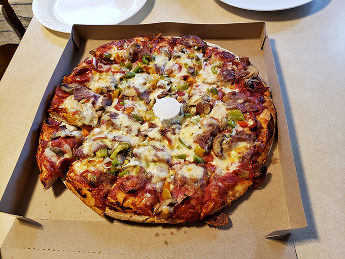 This loaded pizza is what happens when someone says "I'll have everything"&mdash;and the kitchen takes it as a delicious challenge rather than a question.