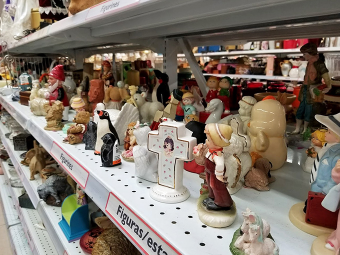 Figurines frozen in time – religious icons, collectible characters, and decorative oddities create a miniature museum of American knick-knack culture.