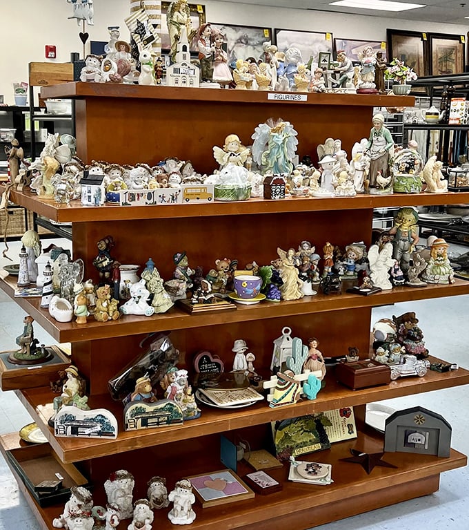 Angel figurines and collectibles galore! Grandma's curio cabinet could be restocked for the price of a fancy coffee.