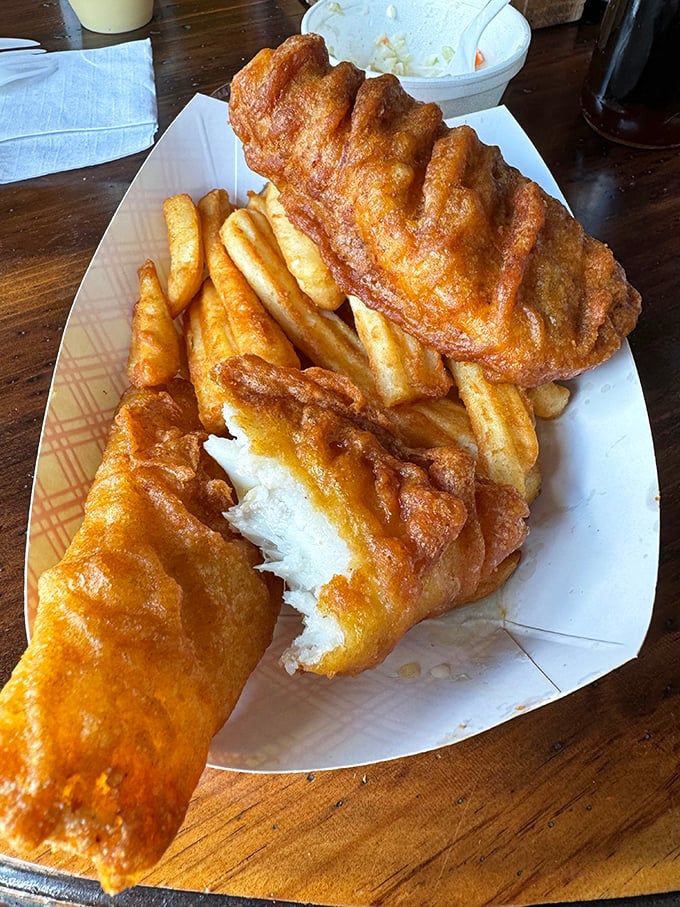 This fish and chips doesn't just flake &ndash; it practically delivers a maritime sermon with each golden-battered, perfectly crispy bite.