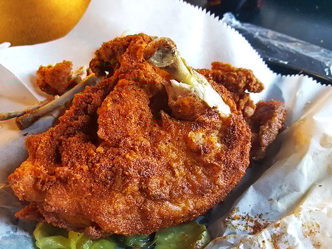 This isn't just fried chicken&mdash;it's edible lava disguised as poultry. That gorgeous red coating is your first clue that taste bud transformation is imminent.