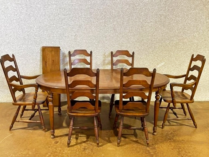This isn't just a dining set; it's a family heirloom waiting to be adopted. Solid wood craftsmanship that's outlasted several smartphone generations.
