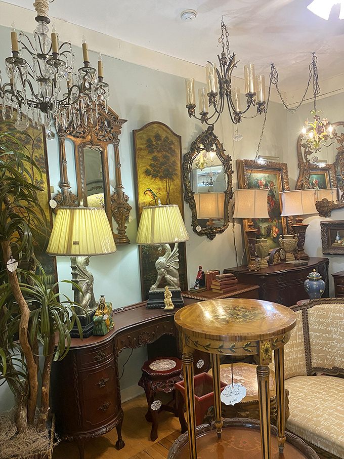 Elegant chandeliers hang like crystal stalactites in this cave of wonders, illuminating furniture that has witnessed more history than your high school textbooks.