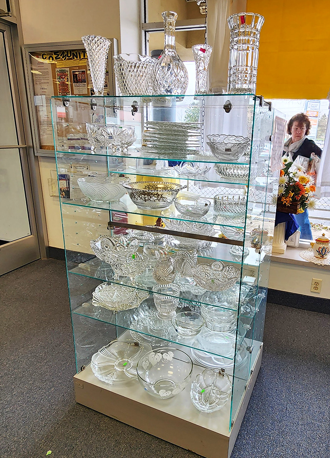 Crystal and glassware that would make your grandmother swoon, displayed with the reverence of museum pieces rather than secondhand treasures.