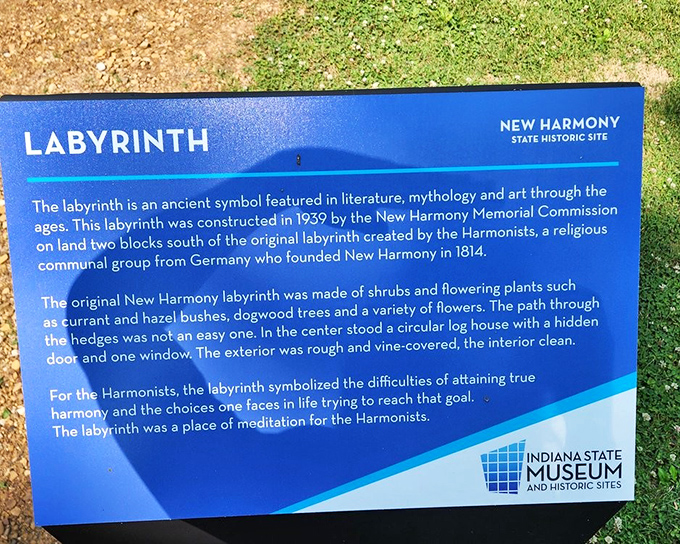 The fine print of paradise&mdash;this sign reveals the labyrinth isn't just pretty hedges, but a spiritual journey in plant form.