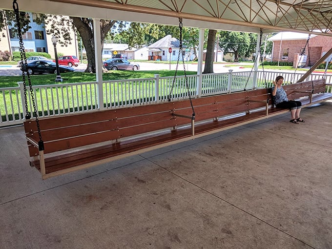 Room for the whole extended family&mdash;and then some! This massive wooden bench swings with surprising grace despite its battleship-worthy chains.