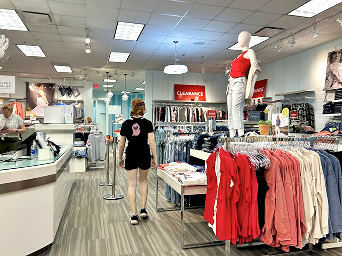 Clearance signs beacon like lighthouses guiding ships to harbor, except these ships are shopping carts and the harbor saves money.