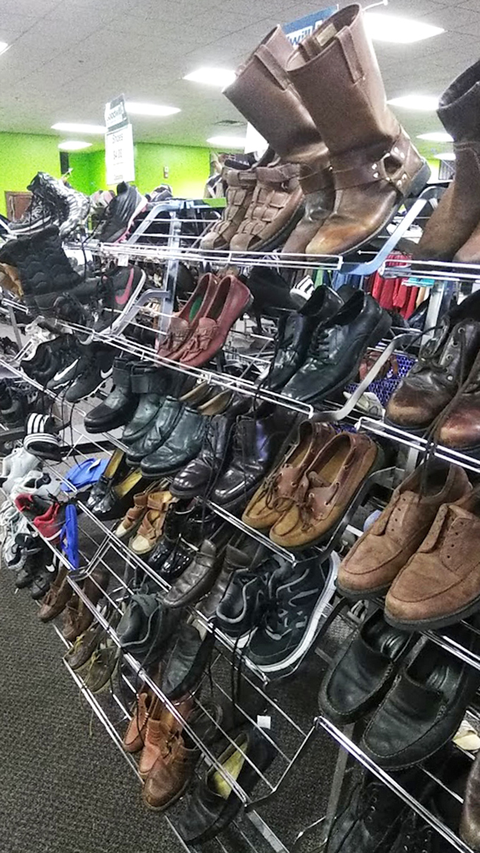 The shoe section: where cowboy boots and loafers live in harmony, each pair waiting to walk a mile in new stories.
