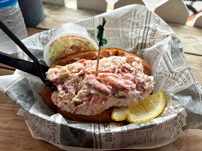 Lobster roll perfection doesn't happen by accident. This newspaper-wrapped beauty contains more treasure than most pirate ships that once sailed these waters.