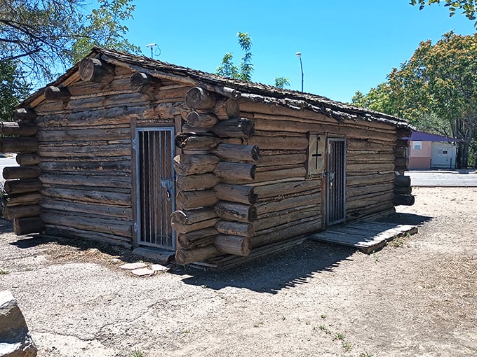 This authentic log cabin stands as a rugged reminder of Silver City's frontier days – no modern conveniences, all historical character.