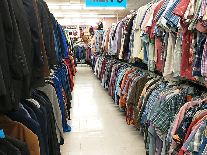 Men's clothing hangs in perfect formation, like a well-dressed army ready for civilian duty.