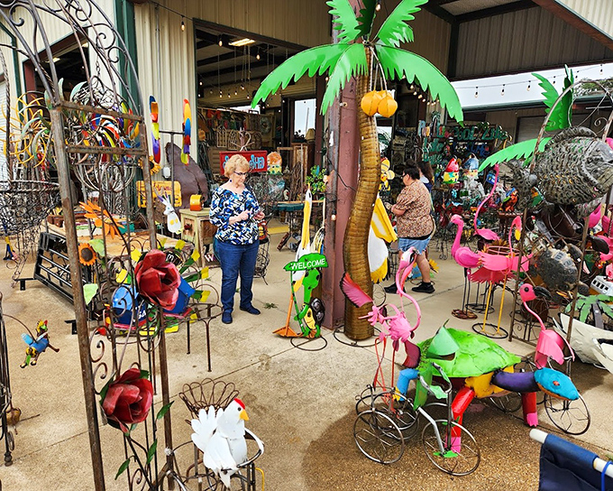Metal menagerie madness! Where else can you find palm trees, flamingos, and whimsical garden creatures all competing for a spot in your backyard?