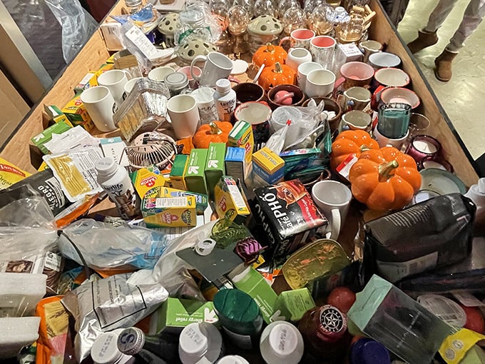 A chaotic cornucopia of mugs, seasonal decorations, and kitchen essentials that would make Marie Kondo simultaneously faint and rejoice.