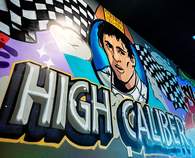 Racing-inspired artwork adorns the walls, fueling your inner speed demon before you even hit the track.