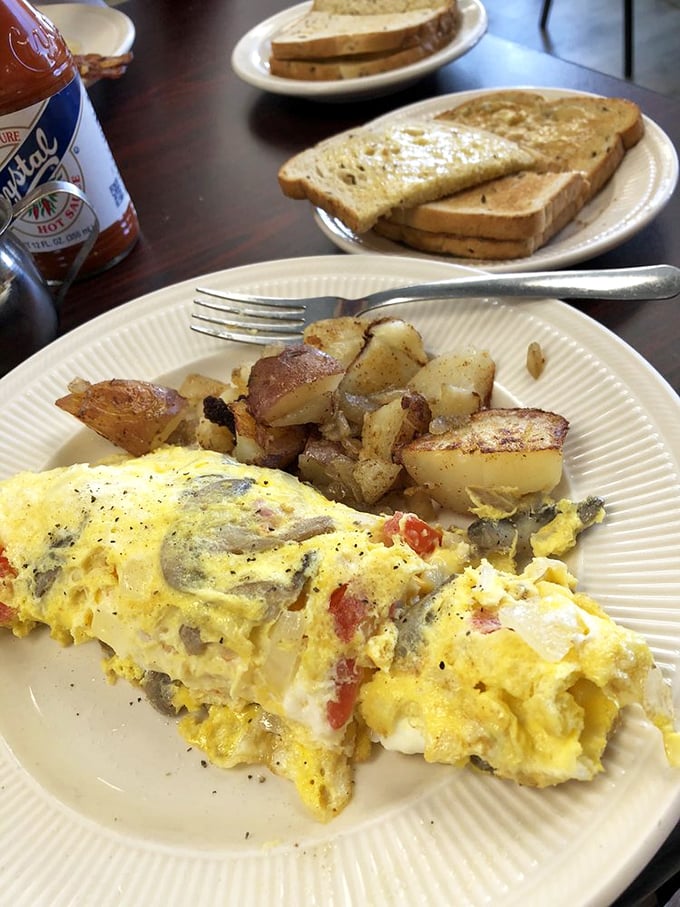 This isn't just an omelet&mdash;it's a masterclass in breakfast architecture, with each bite delivering a perfect ratio of fluffy eggs, melty cheese, and savory fillings.