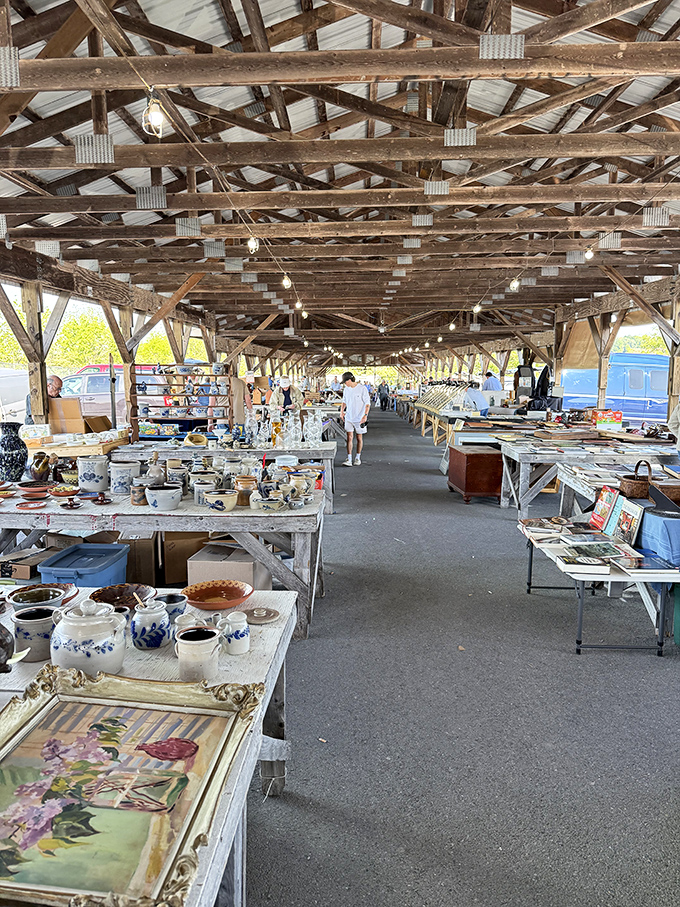 Treasure hunting under rustic beams. This covered outdoor market feels like the physical manifestation of what happens when history gets organized.