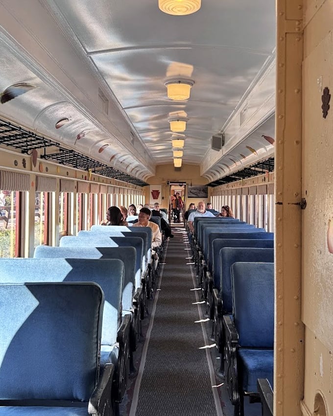 Engine 54 of The Stourbridge Line sports its distinctive orange stripe like a proud badge of honor&mdash;the railway equivalent of a bow tie at a formal dinner.