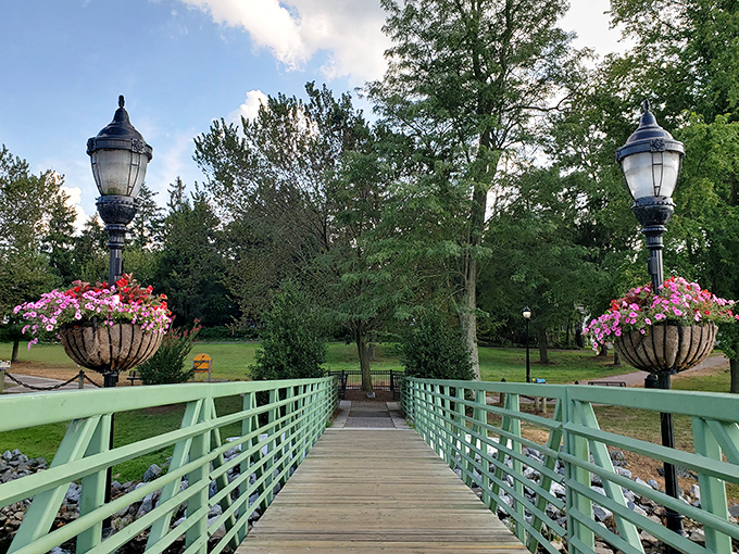 This flower-adorned pedestrian bridge isn't just functional—it's Milford's version of a welcome mat, complete with blooms that would make any gardening show jealous.