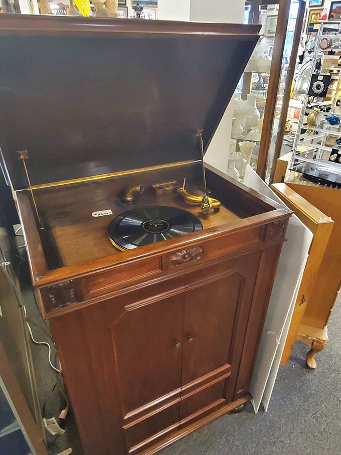 Not your Spotify subscription! This gorgeous wooden phonograph cabinet reminds us of a time when music was a physical experience to be savored, not just streamed.