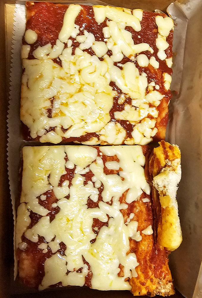 The legendary pizza that launched a thousand debates. Red sauce, melty cheese, and that crust&mdash;oh that crust&mdash;somewhere between heaven and Pennsylvania.