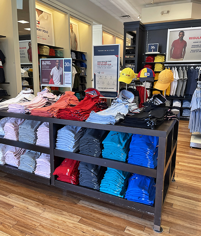 Tommy Hilfiger's rainbow of polos stands ready for inspection. Like a buffet of preppy style, but without the calories!