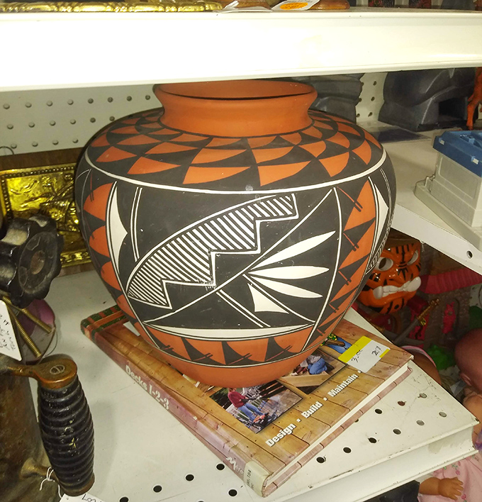 Southwestern artistry in clay: This handcrafted pottery vessel tells stories of geometric precision and cultural heritage with every triangle and line.