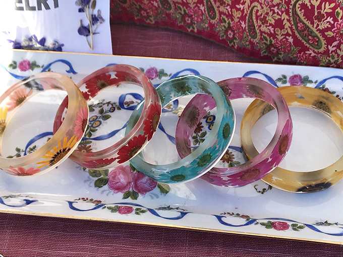 Resin bangles that look like they captured sunset, ocean, and springtime, then froze them into wearable art. Grandkids will fight over these heirlooms someday.