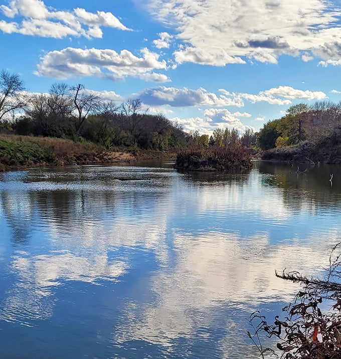 Mirror, mirror on the water&mdash;South Dakota's big sky finds its perfect reflection partner in the calm waters of Fisher Grove.